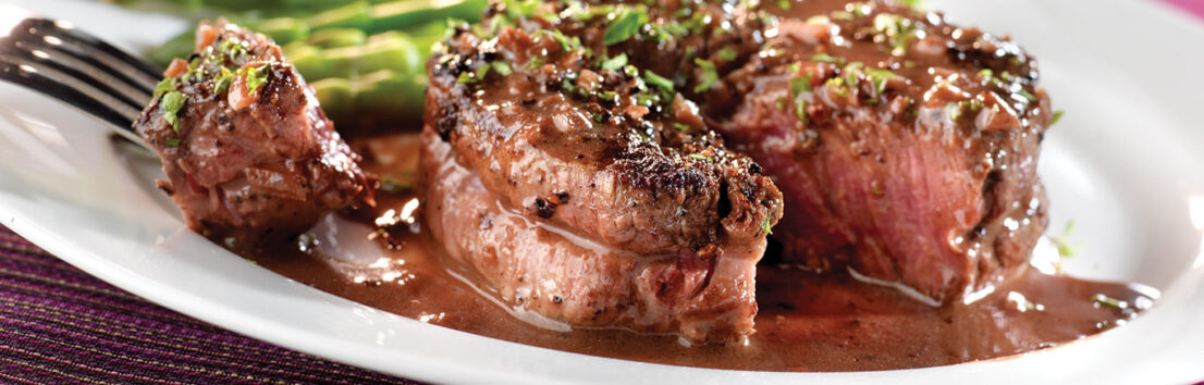 Peppercorn-Seasoned Steaks with Mustard-Wine Sauce | Swanson® Recipes